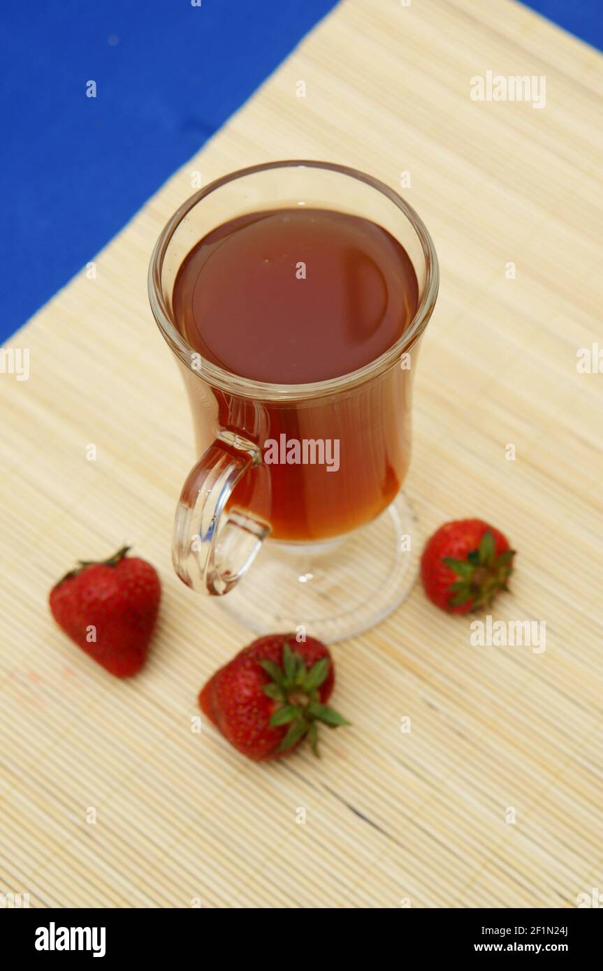 Hot tea with strawberry flavour Stock Photo - Alamy