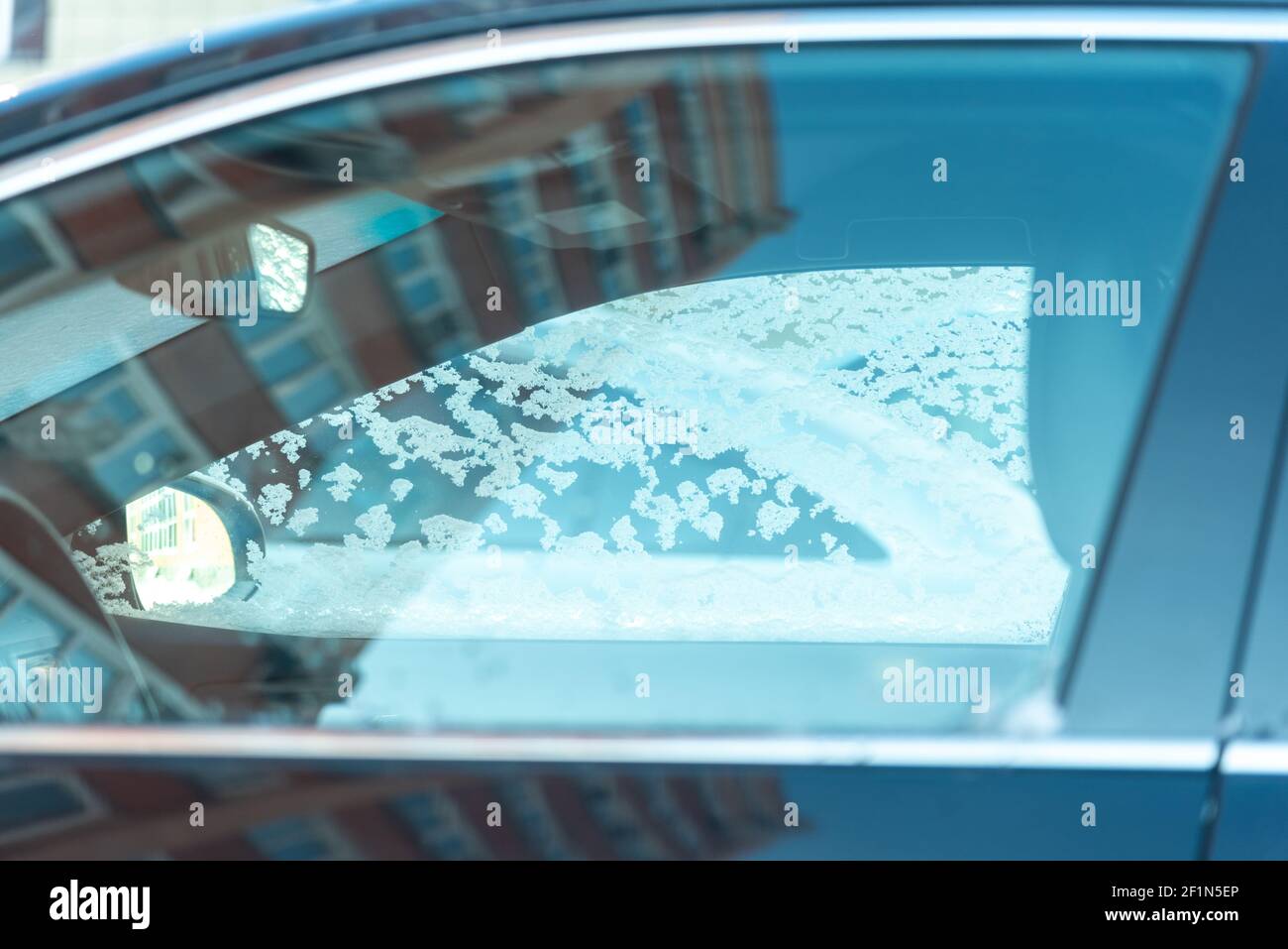 Urban abstract photo through the side windows of the car, the ...