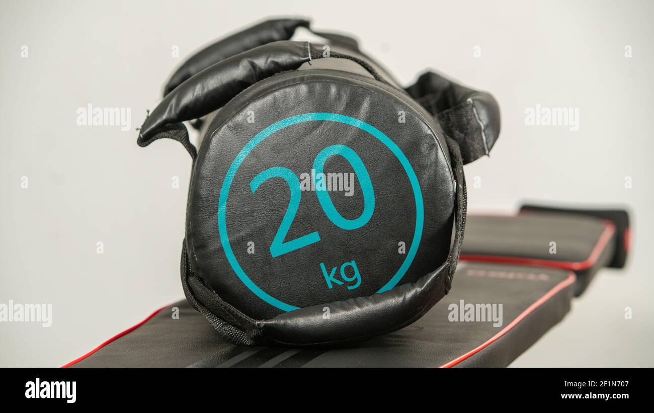 Lifting heavy bag hi-res stock photography and images - Alamy