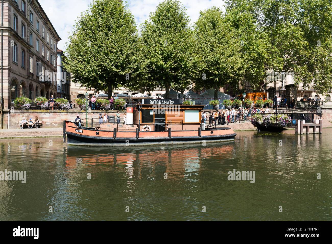 Strasbourg canals with boats ready for sightseeing cruises through the ...
