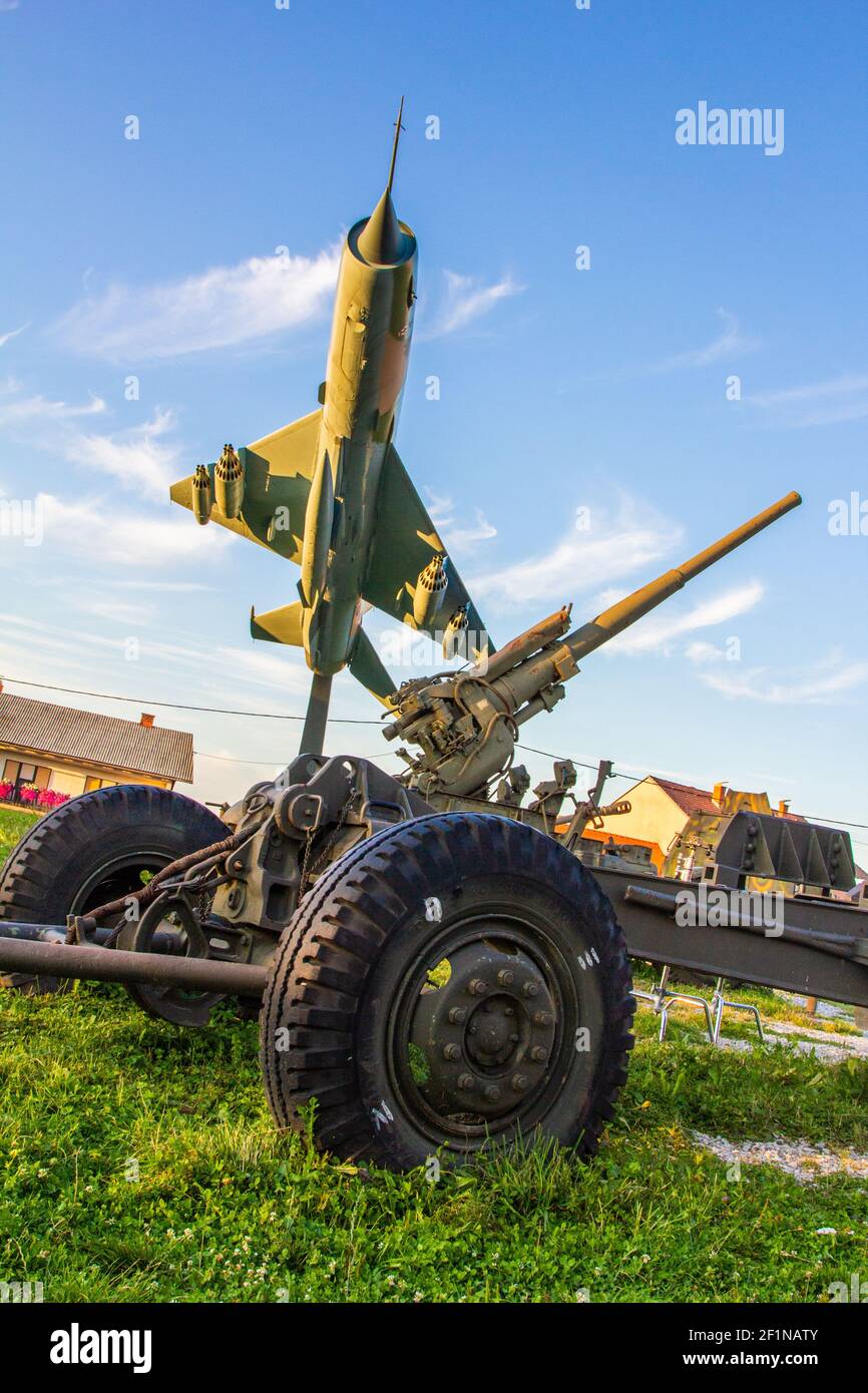 KARLOVAC, CROATIA - Aug 12, 2011: Fighter plane and a gun in The ...