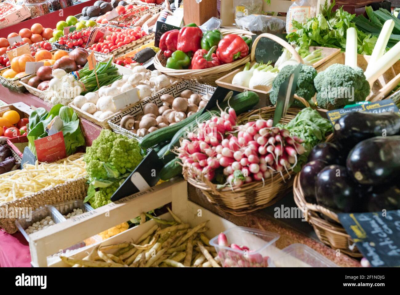 Vegetable stand in the market hall in Quimper with fresh organic ...