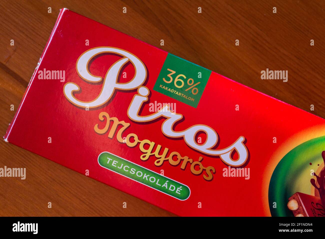 Wrapper of Piros mogyoros tejcsokolade (Red nut milk chocolate bar ...