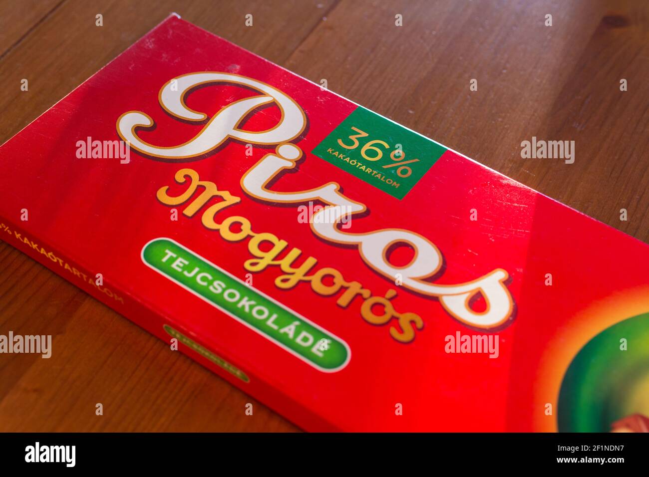 Wrapper of Piros mogyoros tejcsokolade (Red nut milk chocolate bar ...