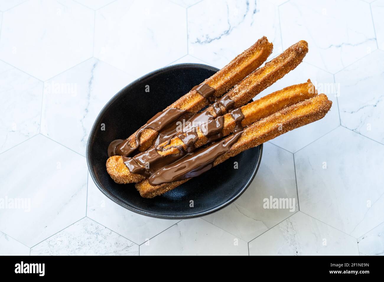 Churros Sticks with Chocolate Sauce . Fried Dough Pastry Traditional ...