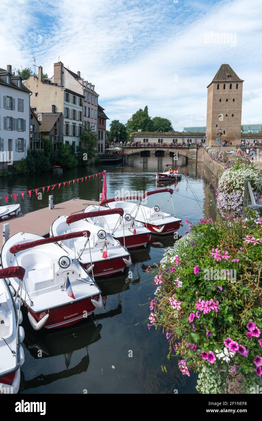 Strasbourg canals with boats ready for sightseeing through the old town ...