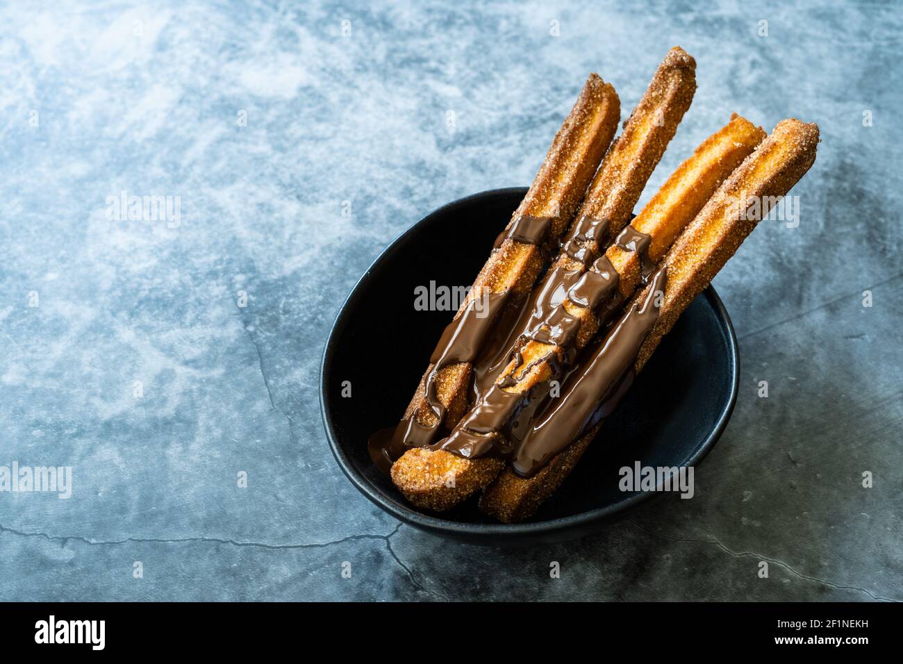 Churros Sticks with Chocolate Sauce . Fried Dough Pastry Traditional ...