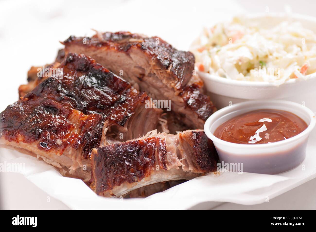 pork ribs take away meal with cole slaw and sauce, food truck style ...