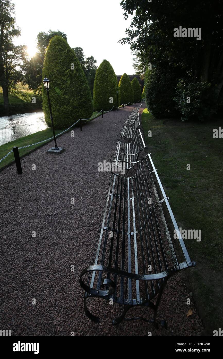 Ayr, Ayrshire, Scotland , UK .Metal bench in formal gardens Stock Photo ...