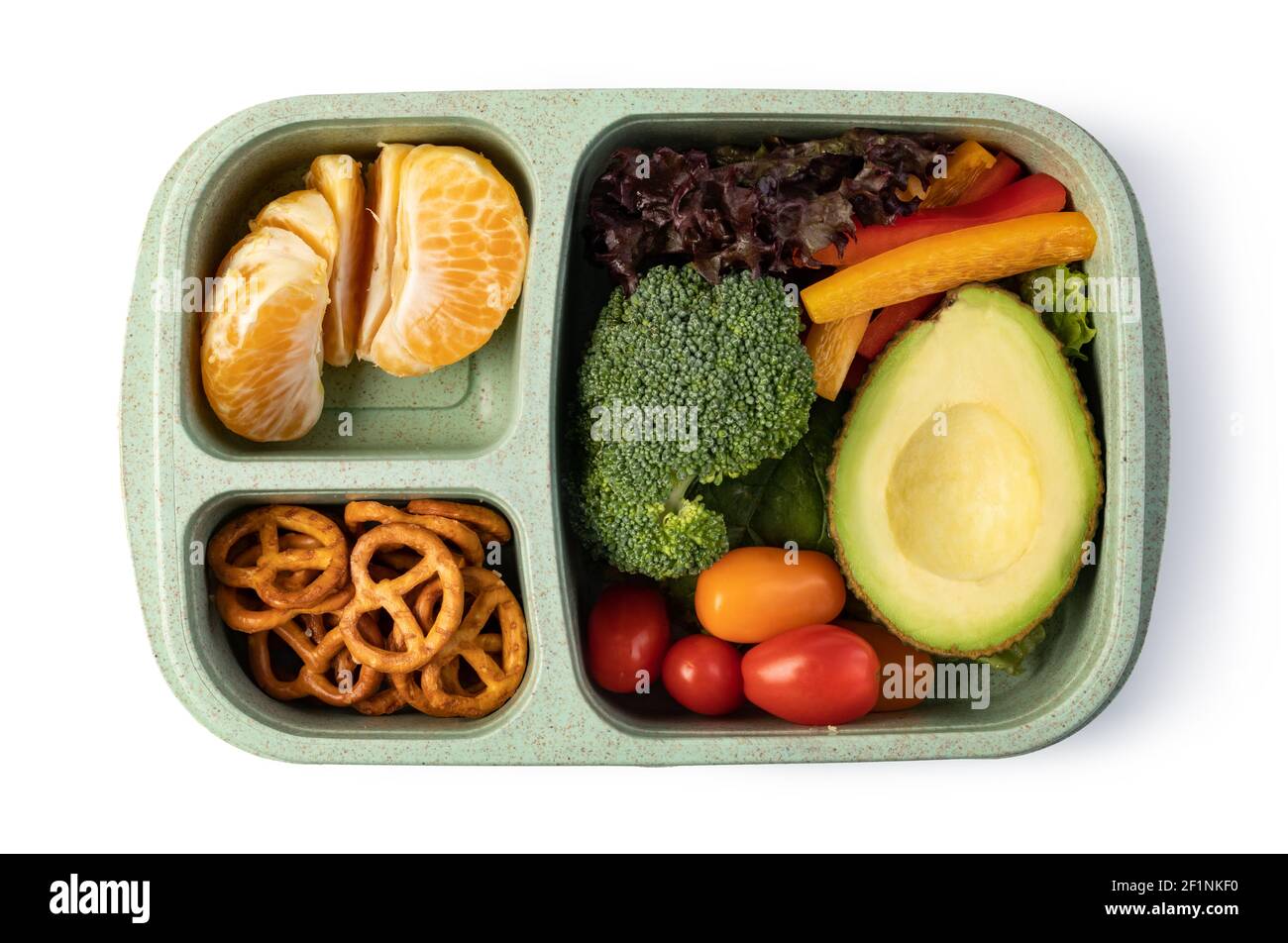 Lunch box with delicious food on a white background Stock Photo - Alamy