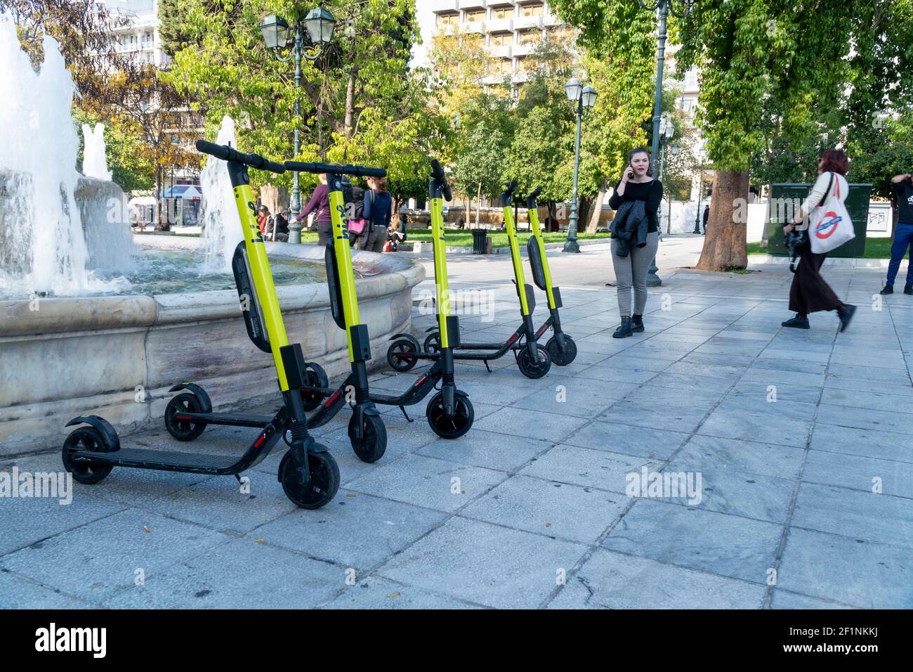 Using electric scooters hi-res stock photography and images - Alamy