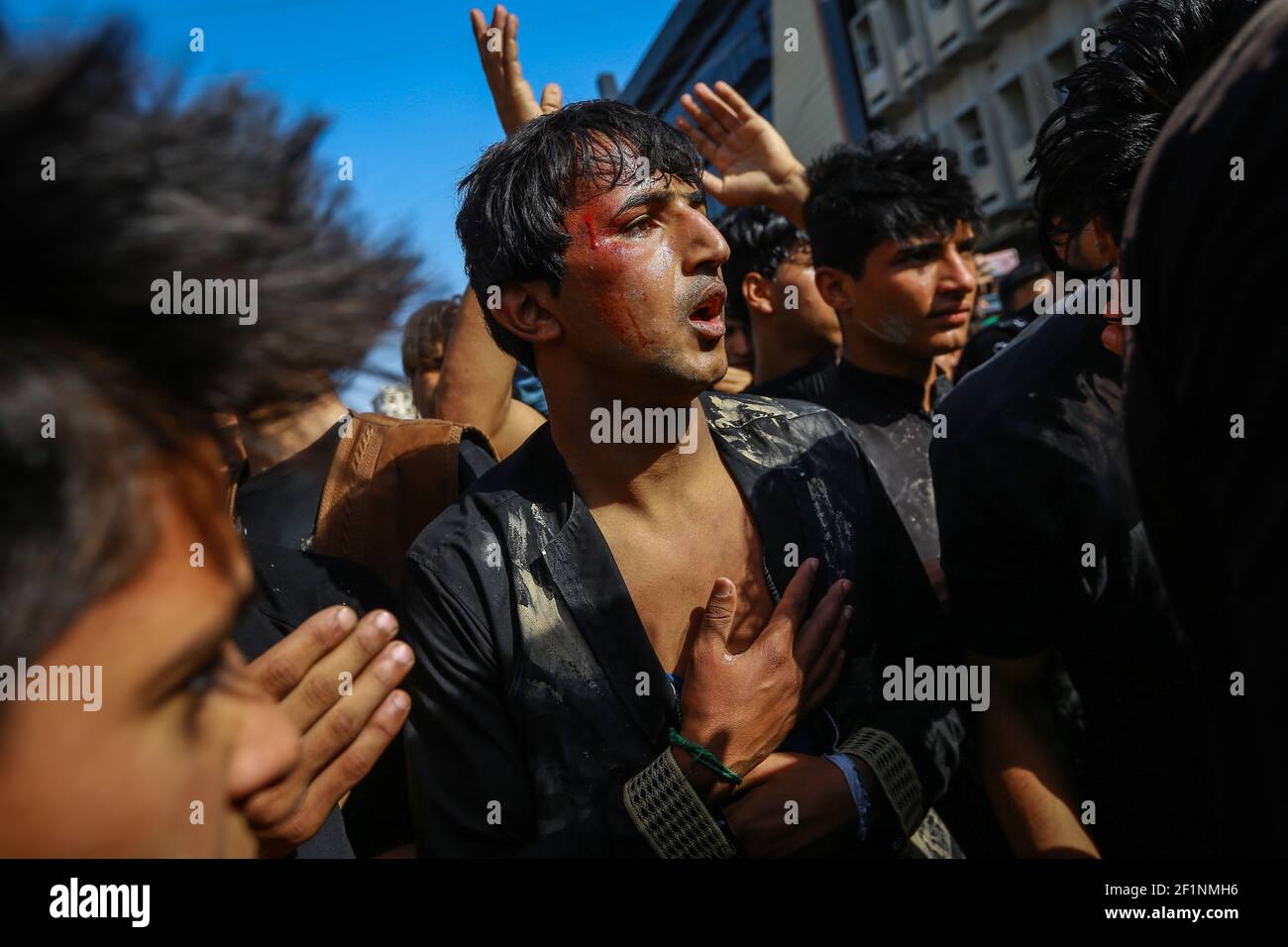 Bagdad, Iraq. 09th Mar, 2021. An Iraqi Shiite Muslim man bleeds from ...