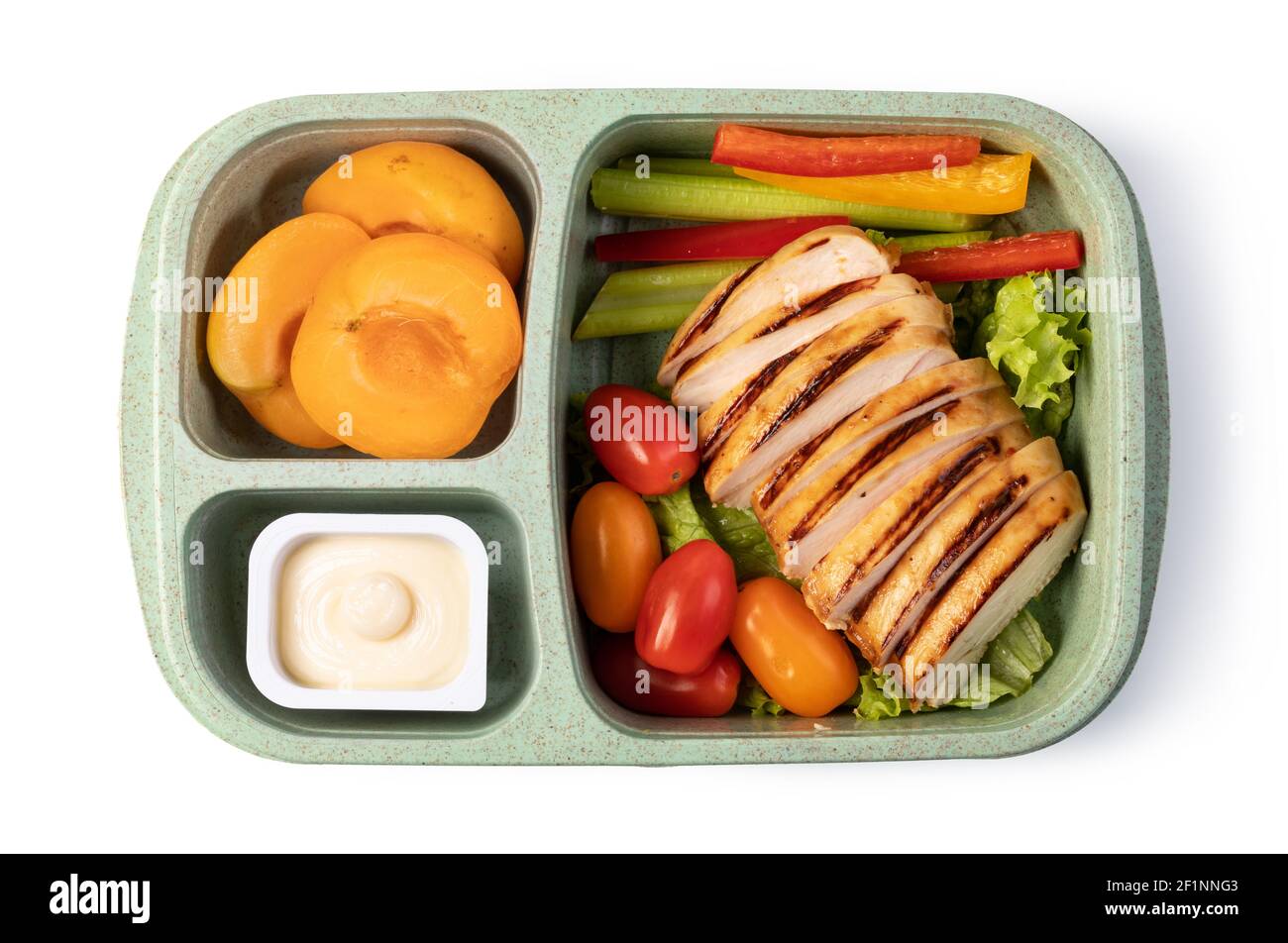 Lunch box with delicious food on a white background Stock Photo - Alamy