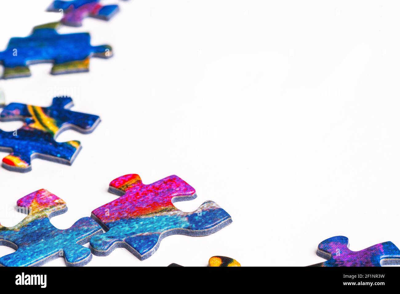 Several puzzle pieces on a white background. Disconnected pieces of a ...