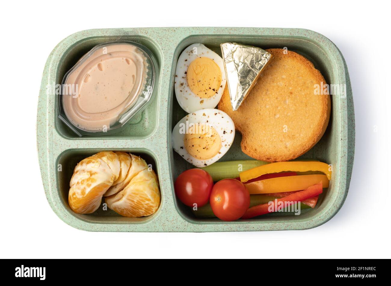 Lunch box with delicious food on a white background Stock Photo - Alamy