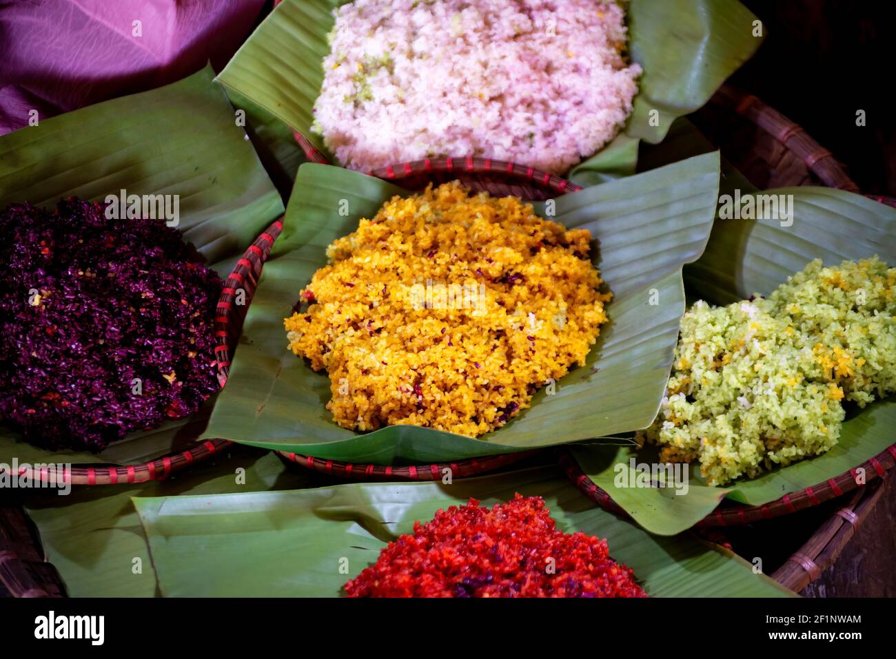 Colorful rice. Each type of rice is dyed with a different type of leaf ...