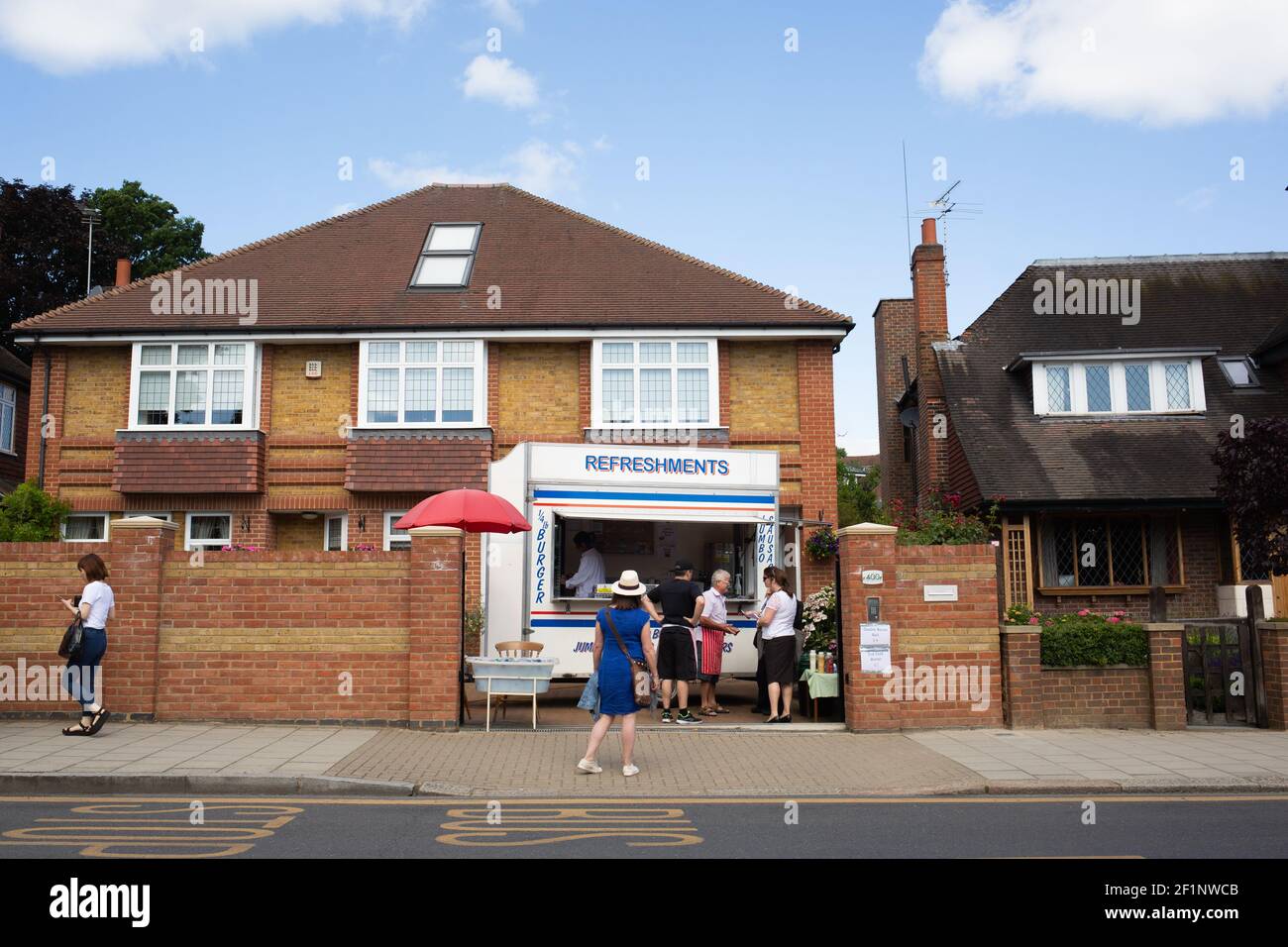 A refreshments stall erected outside a home on the main walk between ...