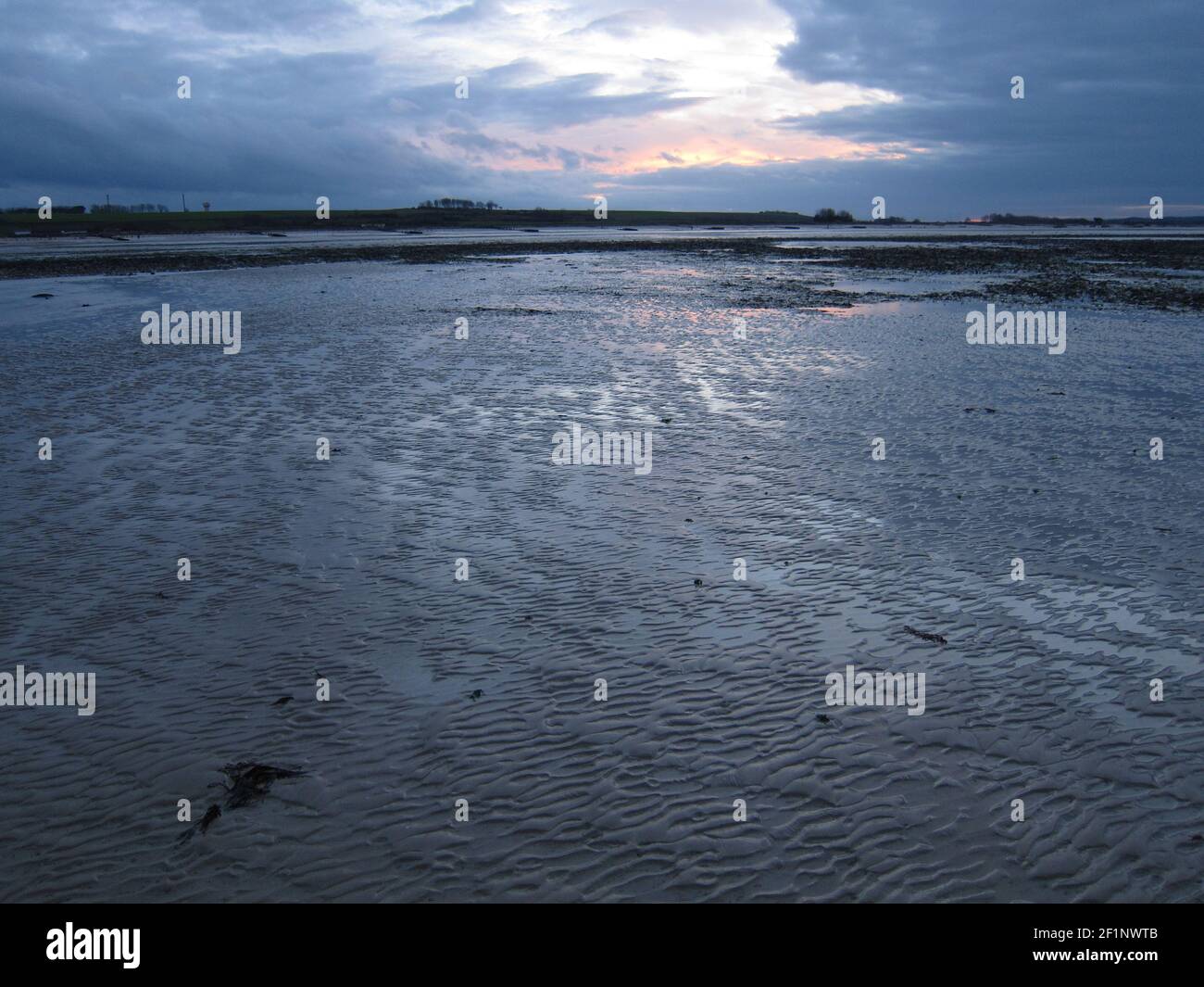 The foreshore at night in Normandy Stock Photo - Alamy