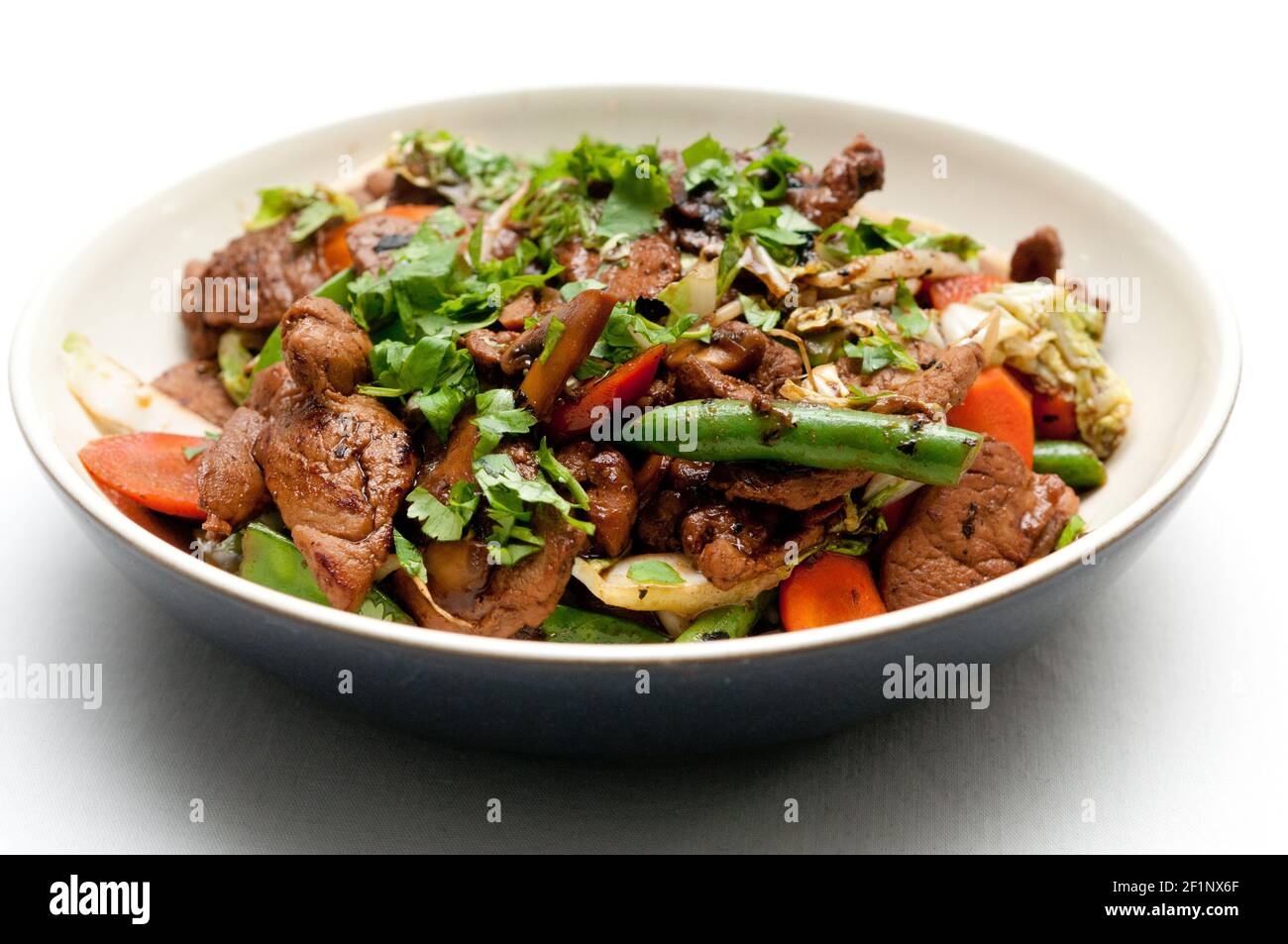 fresh stir fried vegetables and diced pork tenderloin Stock Photo - Alamy