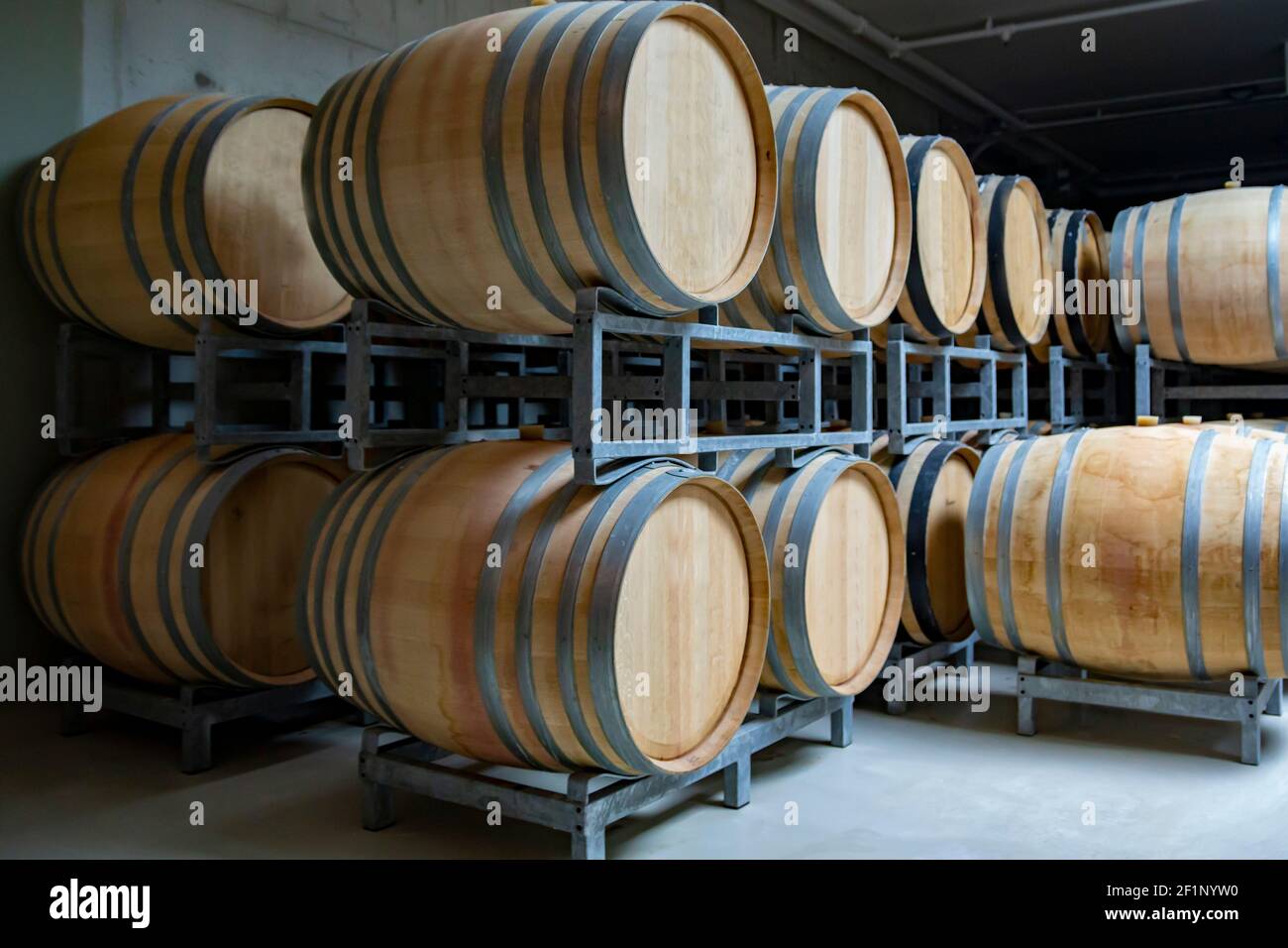 Wooden oak distillery barrels Stock Photo - Alamy