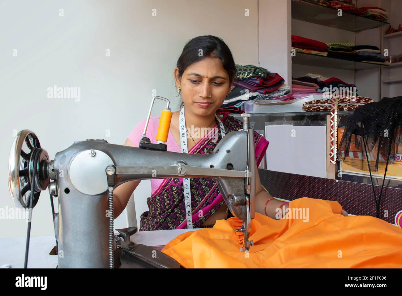 indian woman tailor or boutique owner at her workshop Stock Photo - Alamy