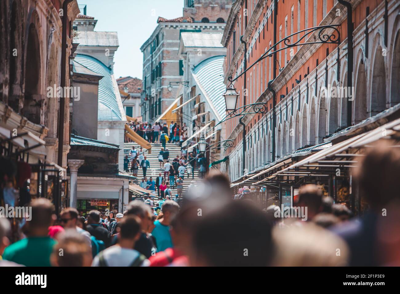 VENICE, ITALY - May 25, 2019: people walking by over crowded venice ...