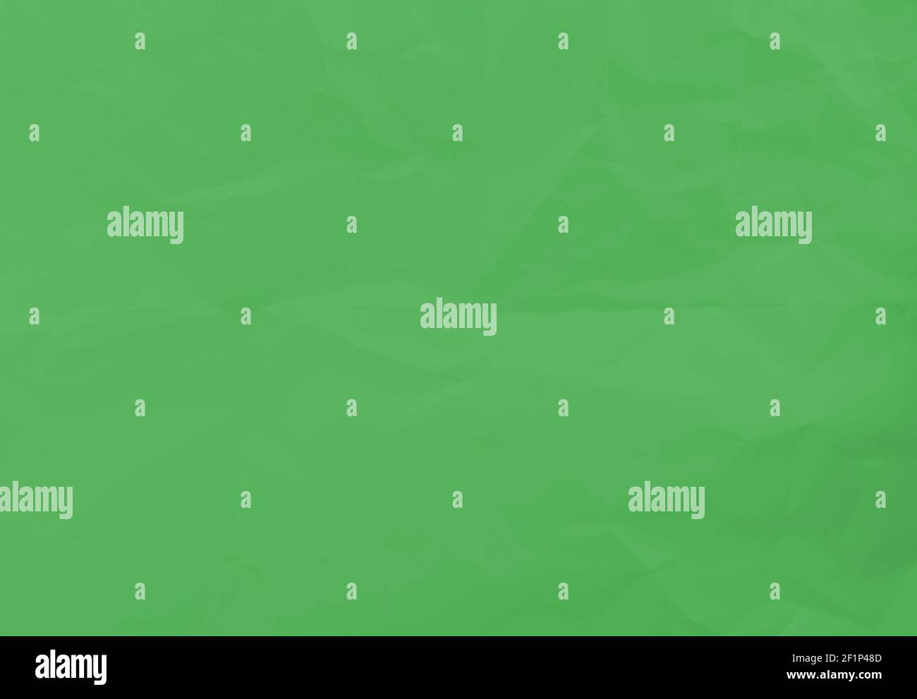 A closeup of crumpled green paper texture Stock Photo - Alamy