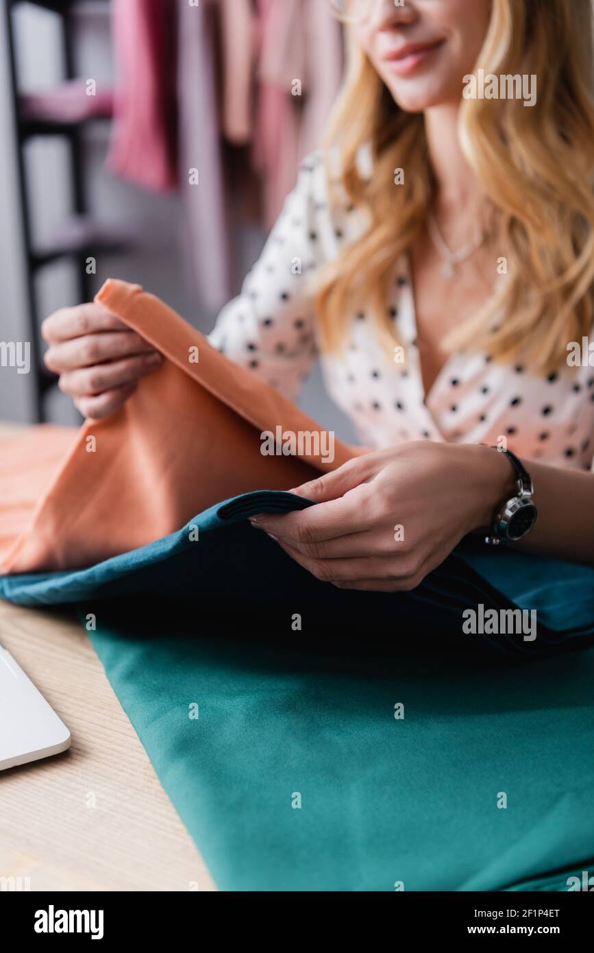 Comparing clothes store hi-res stock photography and images - Alamy