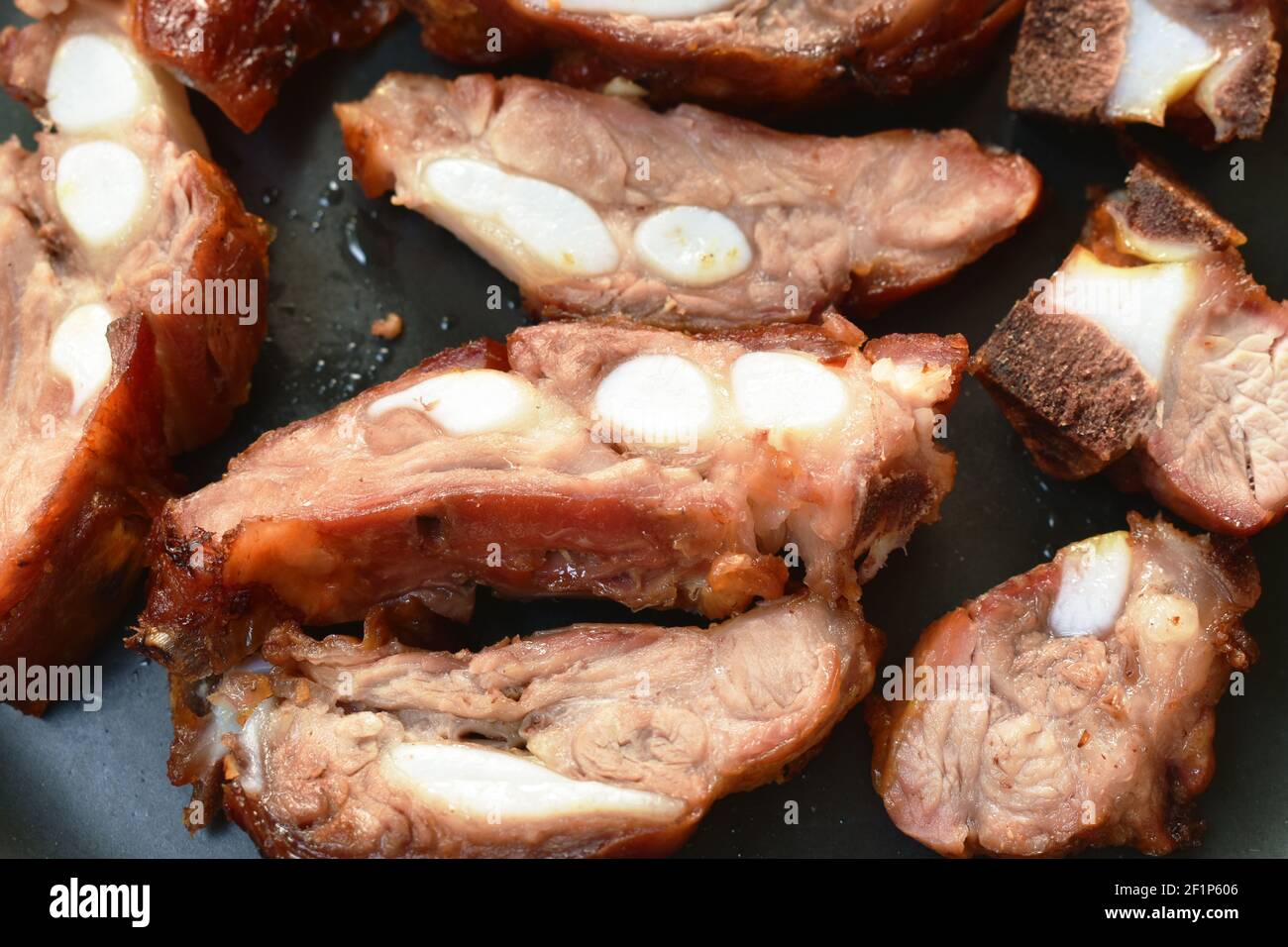 grilled pork bone slice dipping spicy chili sauce eat couple fresh cos ...