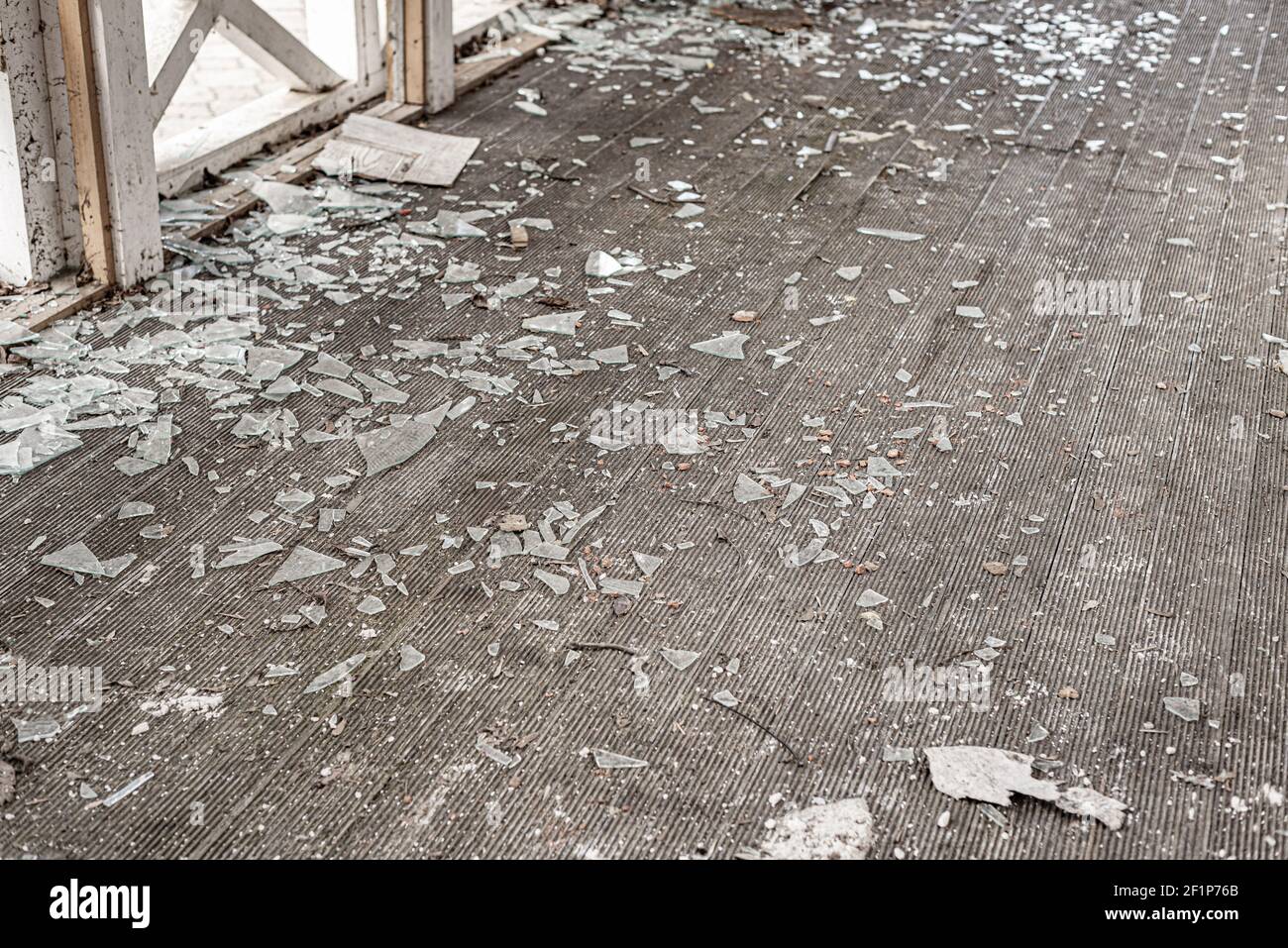 A ruined building with broken glass windows Stock Photo - Alamy