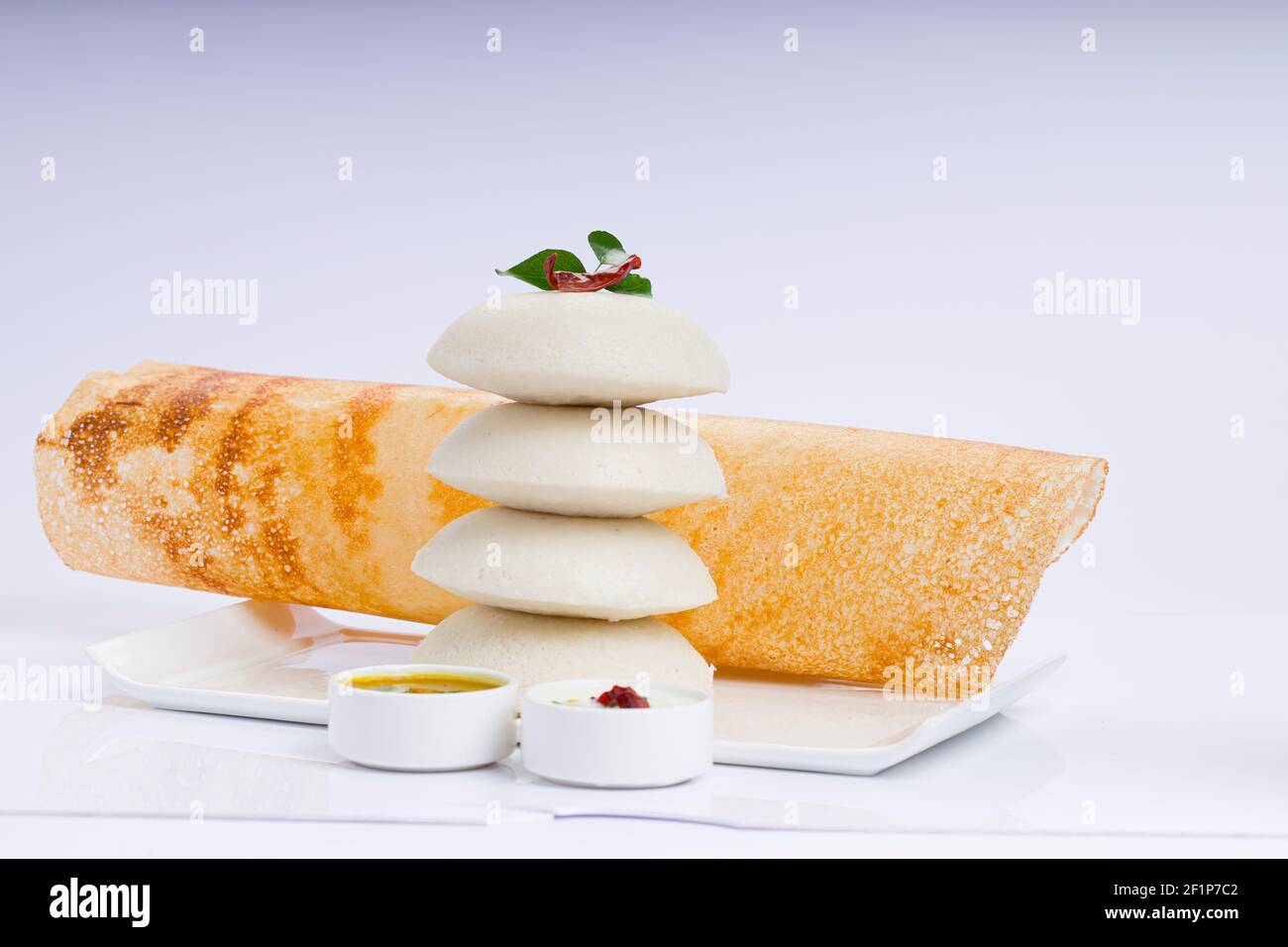 Ghee roast Dosa and Idlii, south indian main breakfast item which is ...