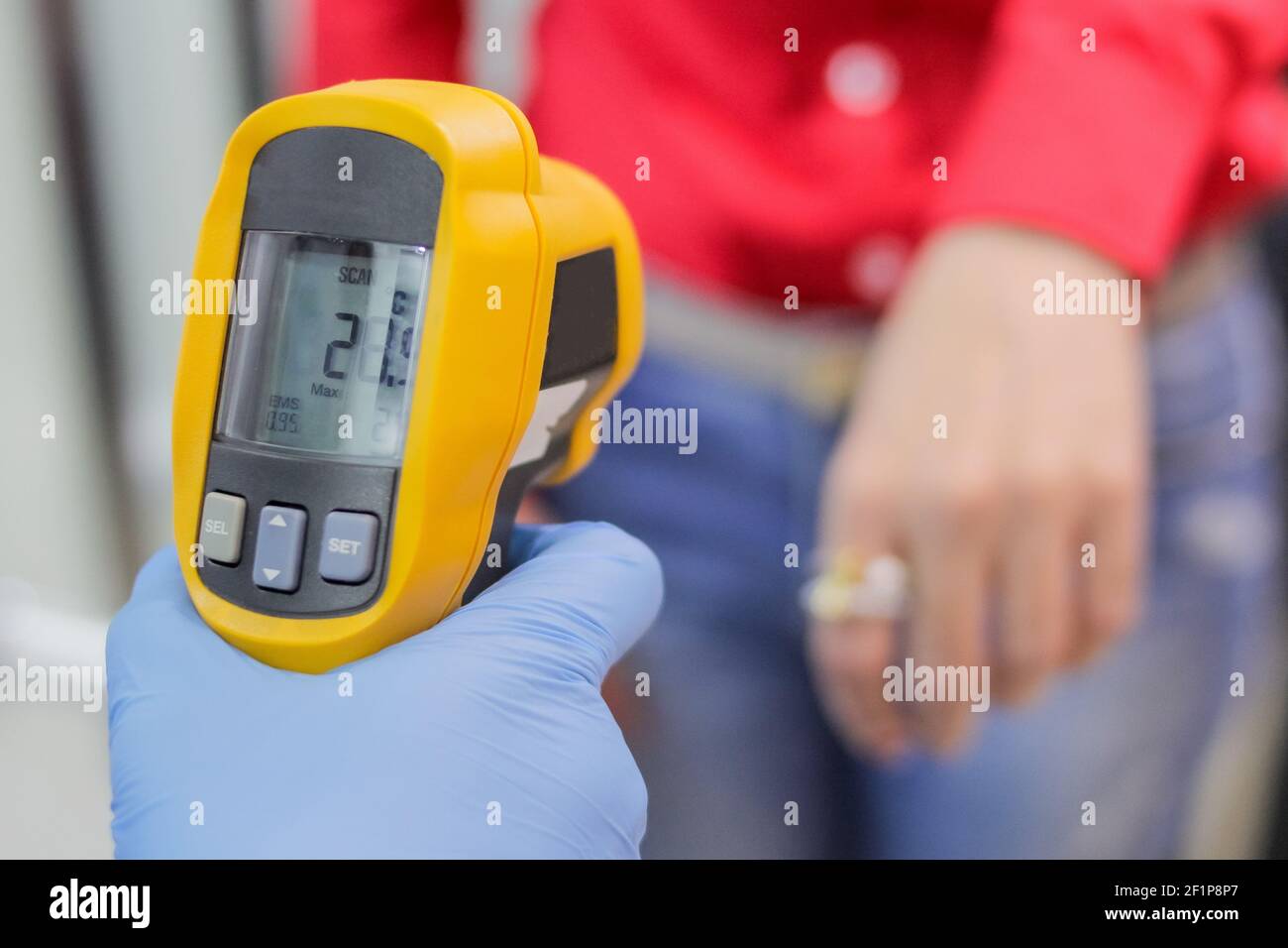 An individual practicing hand hygiene, a vital step in preventing the ...