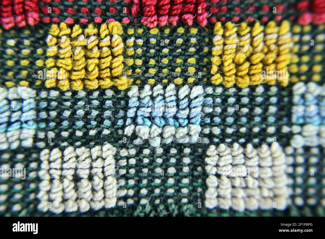 colored cotton weaving, consumed by the wear of time Stock Photo - Alamy