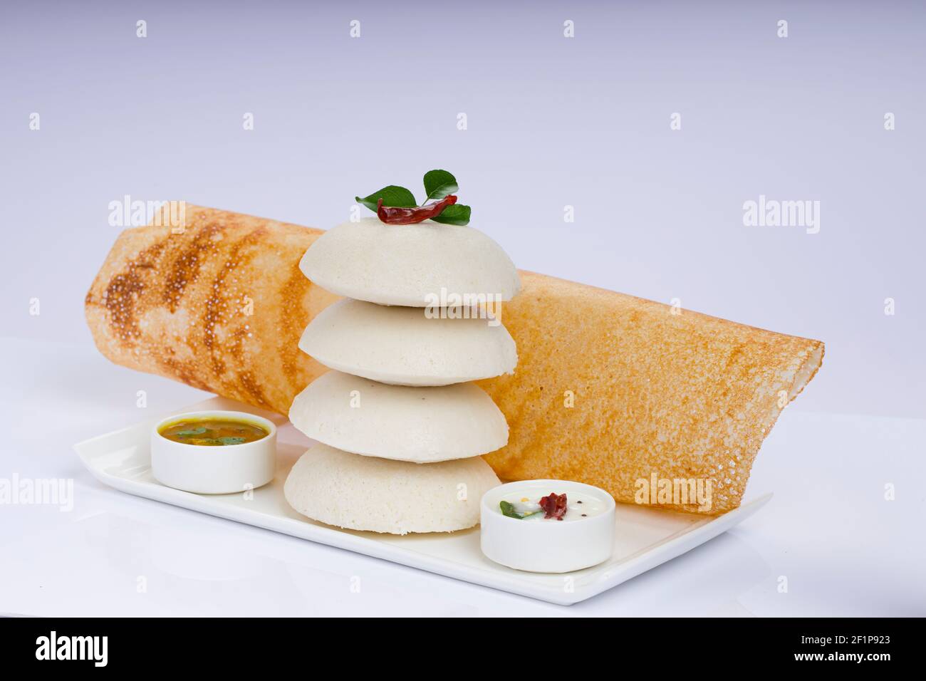 Ghee roast Dosa and Idlii, south indian main breakfast item which is ...