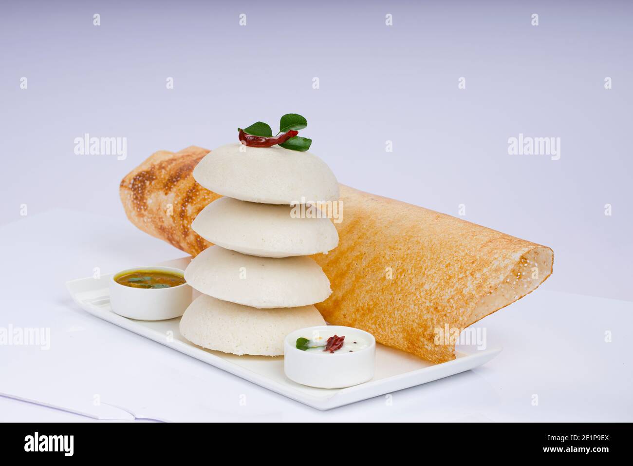 Ghee roast Dosa and Idlii, south indian main breakfast item which is ...