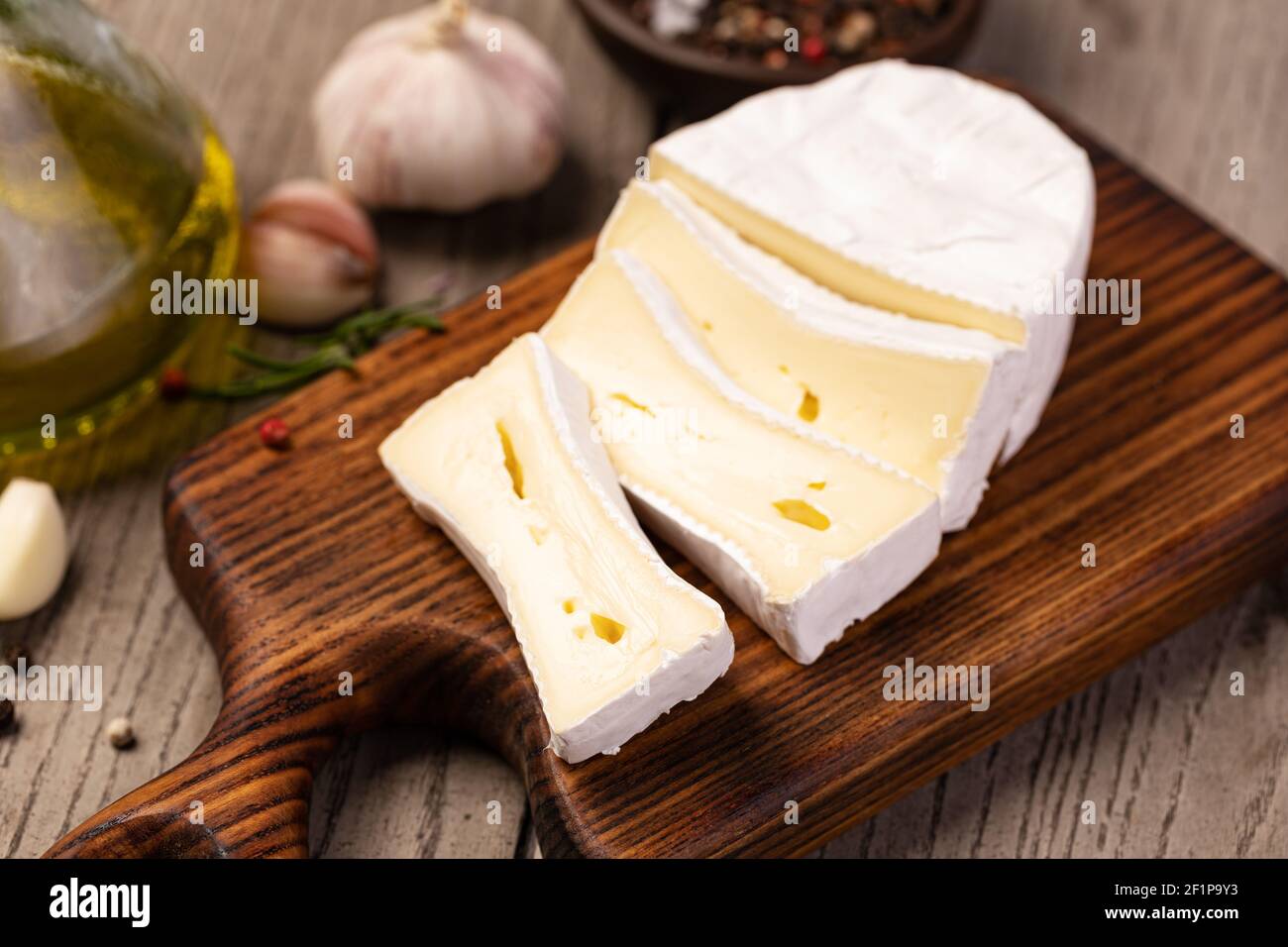 Cut brie cheese hi-res stock photography and images - Alamy