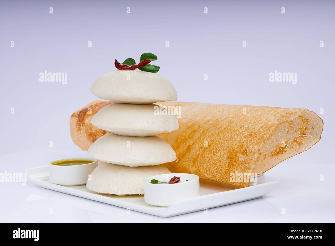 Ghee roast Dosa and Idlii, south indian main breakfast item which is ...