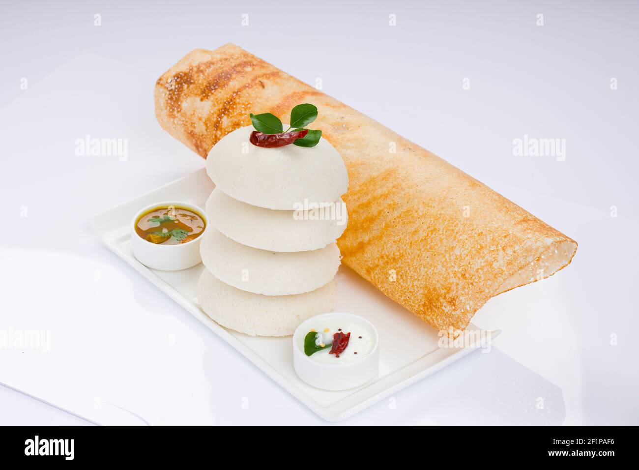 Ghee roast Dosa and Idlii, south indian main breakfast item which is ...