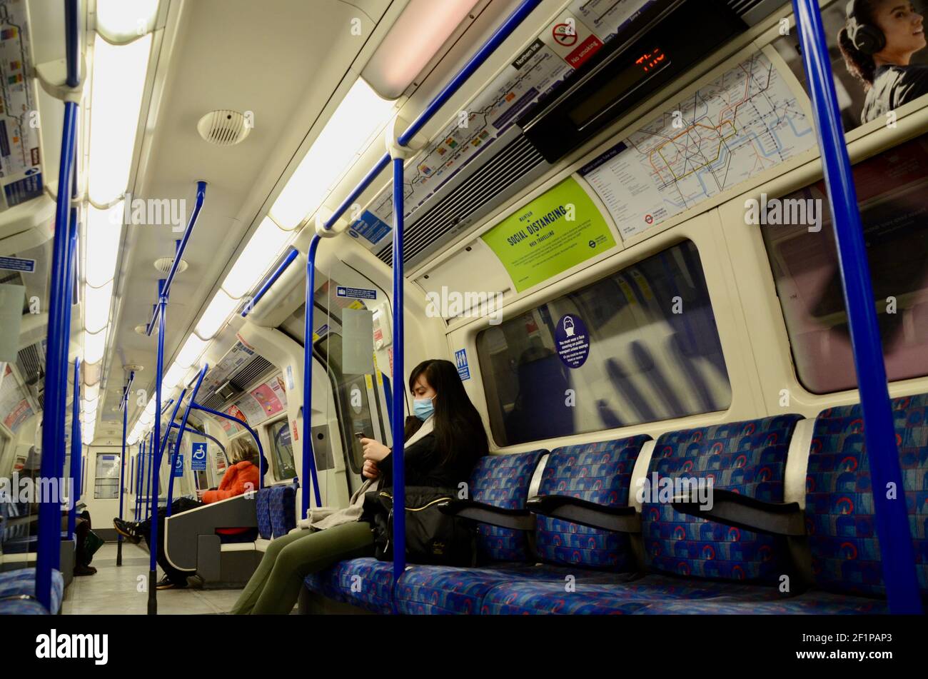 passengers and covid 19 pandemic face covering and social distancing ...