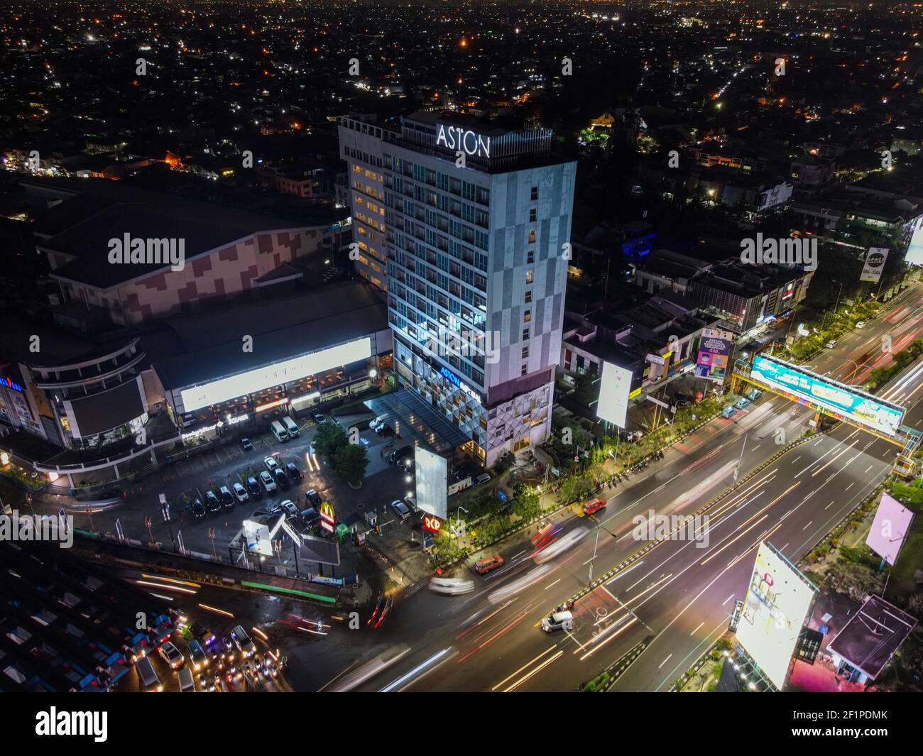 Aerial view of Apartment Aston Location Bekasi at night. Bekasi ...