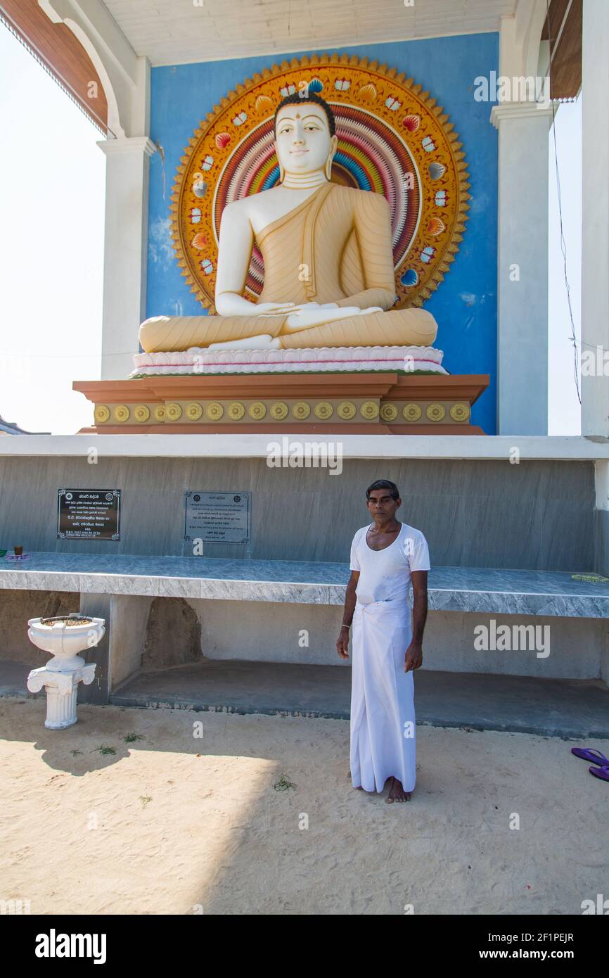 UNAWATUNA, SRI LANKA - JANUARY 23, 2014: Unidentified man at Temple ...