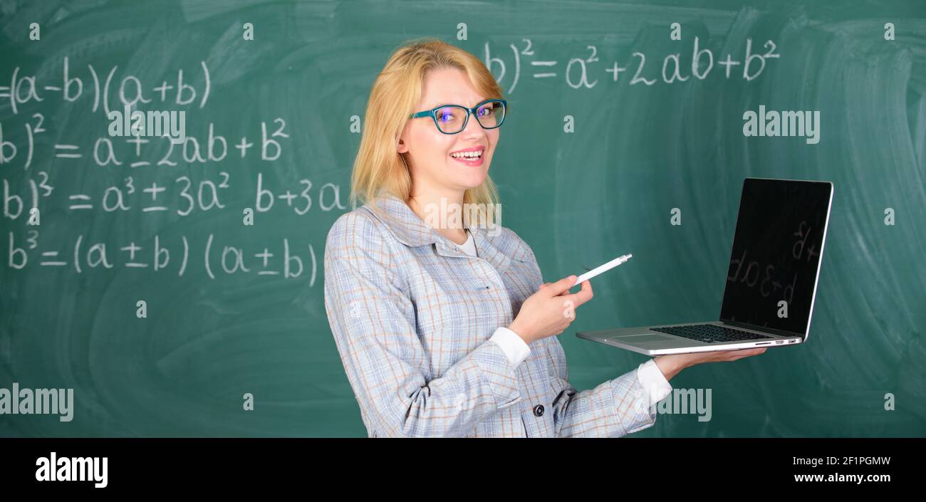 Digital technologies concept. Educator smart lady with modern laptop ...