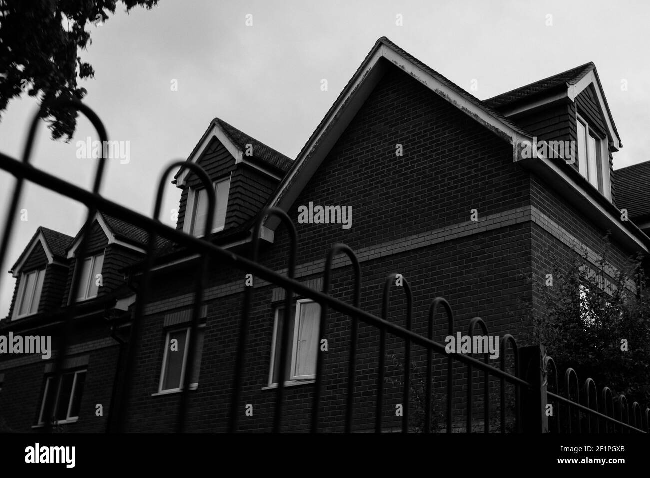 A grayscale shot of house architecture Stock Photo - Alamy
