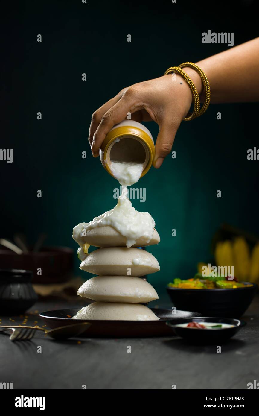 Hand pouring rice hi-res stock photography and images - Alamy