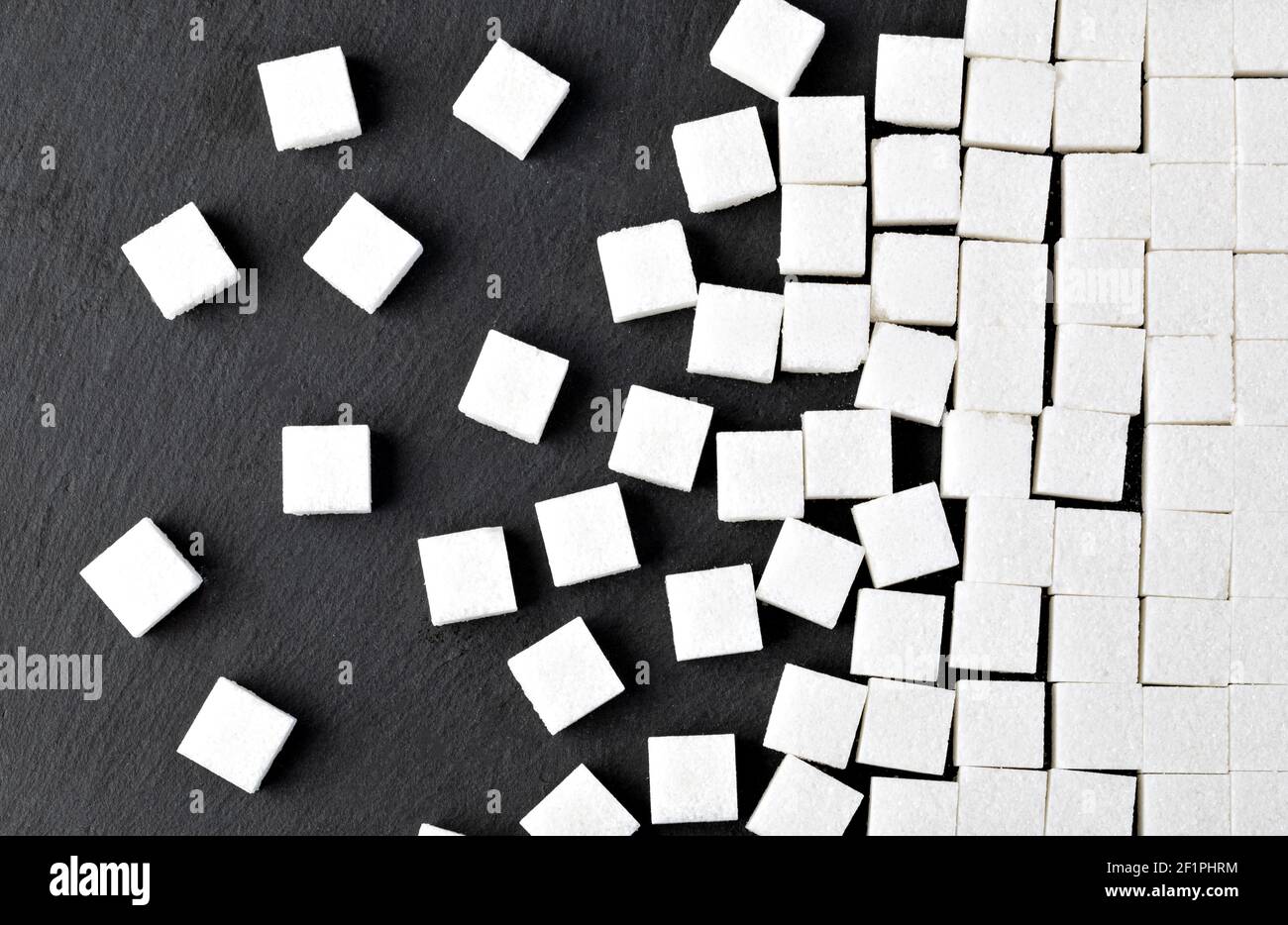 Sugar cubes background Stock Photo - Alamy