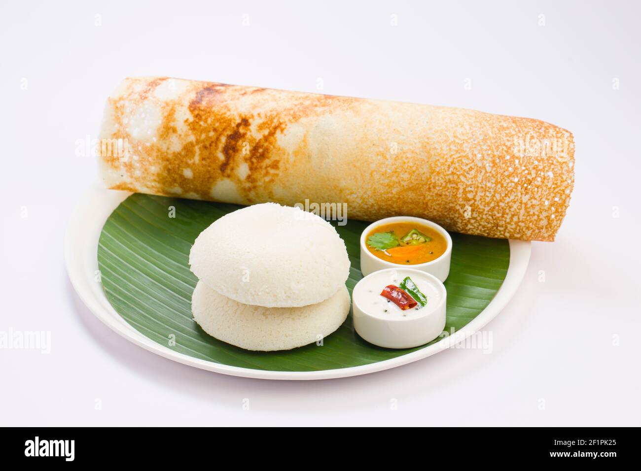 Ghee roast Dosa and Idlii, south indian main breakfast item which is ...