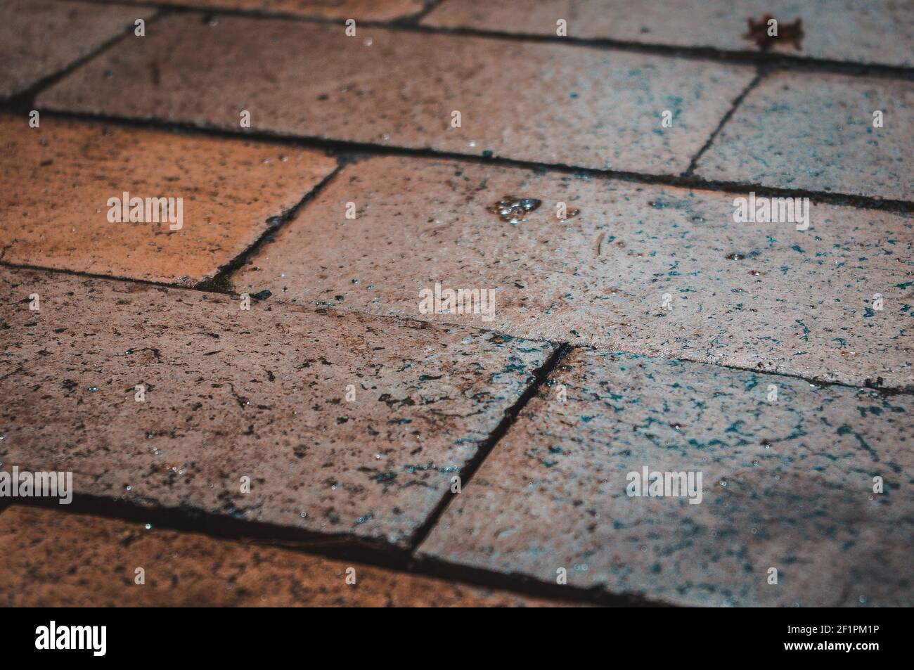 Concrete tile walkway wet hi-res stock photography and images - Alamy