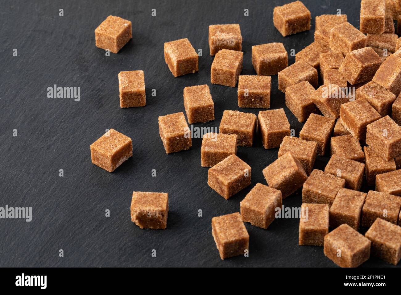 Sugar cubes background Stock Photo - Alamy