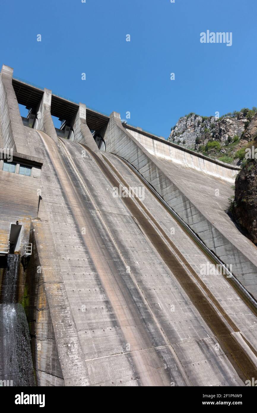 High concrete dam wall view Stock Photo - Alamy