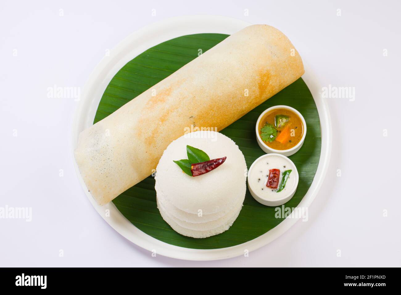 Ghee roast Dosa and Idlii, south indian main breakfast item which is ...